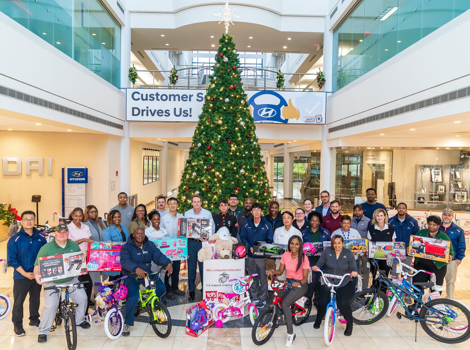 HMMA TEAM MEMBERS DONATE BICYCLES AND TOYS TO MARINE CORPS TOYS FOR ...